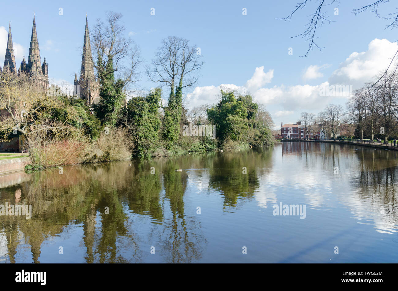 Three spires of Lichfield Cathedral and Minster Pool viewed from Bird ...