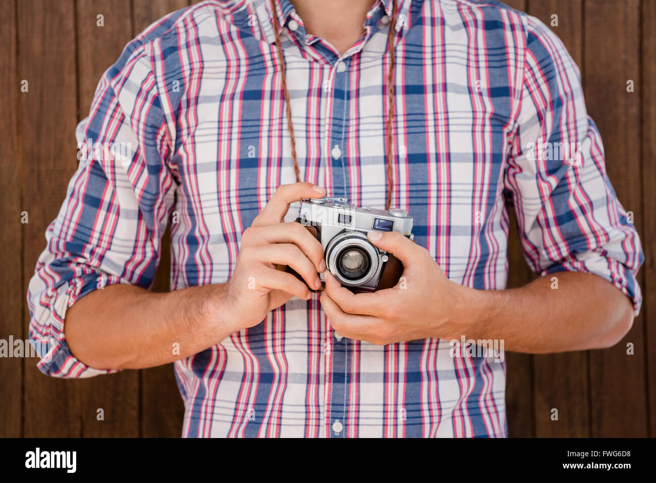 Man photographing with camera Stock Photo - Alamy
