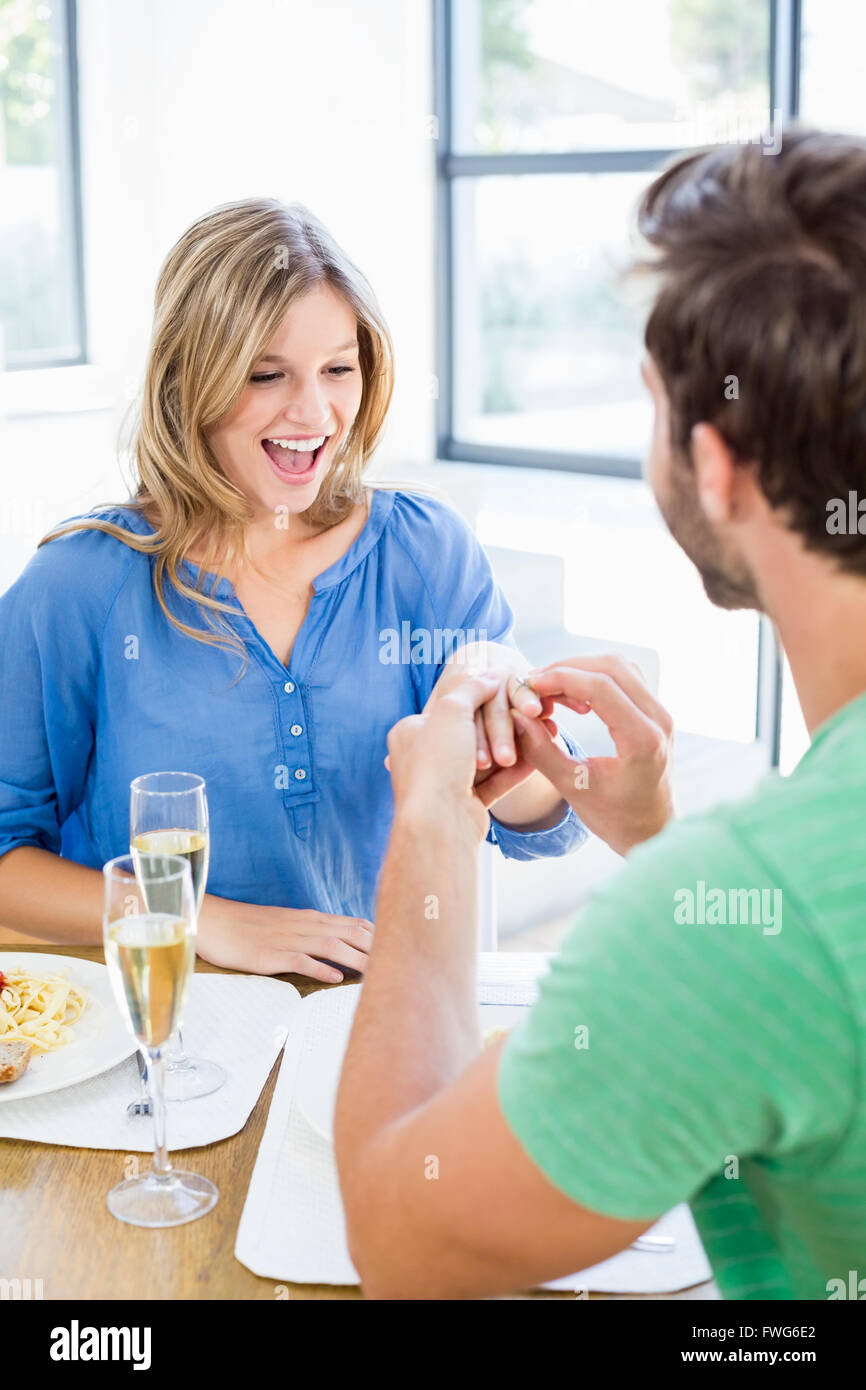 Man gifting finger ring to his woman Stock Photo - Alamy
