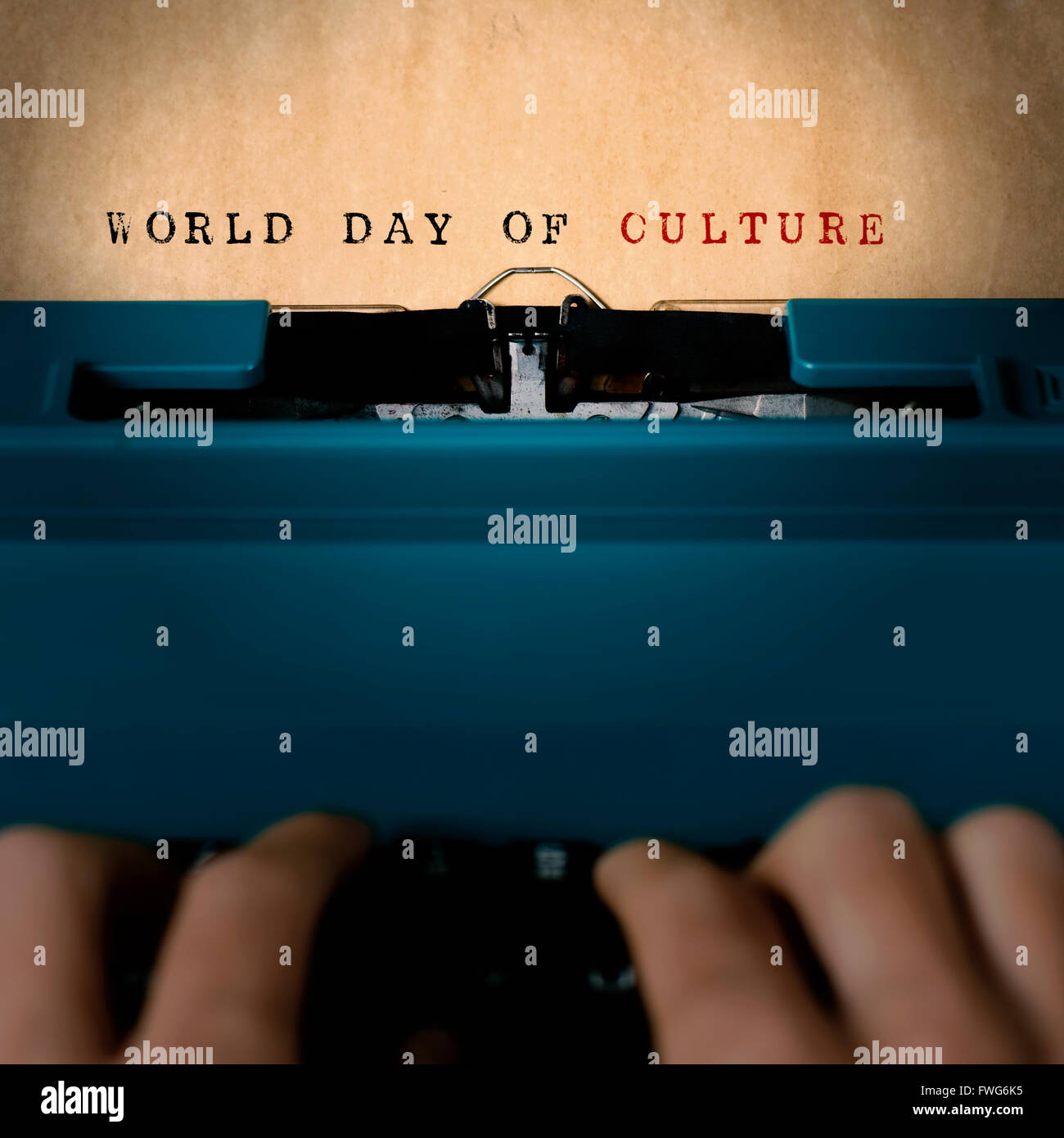 the text world day of culture written in a yellowish paper with a blue ...