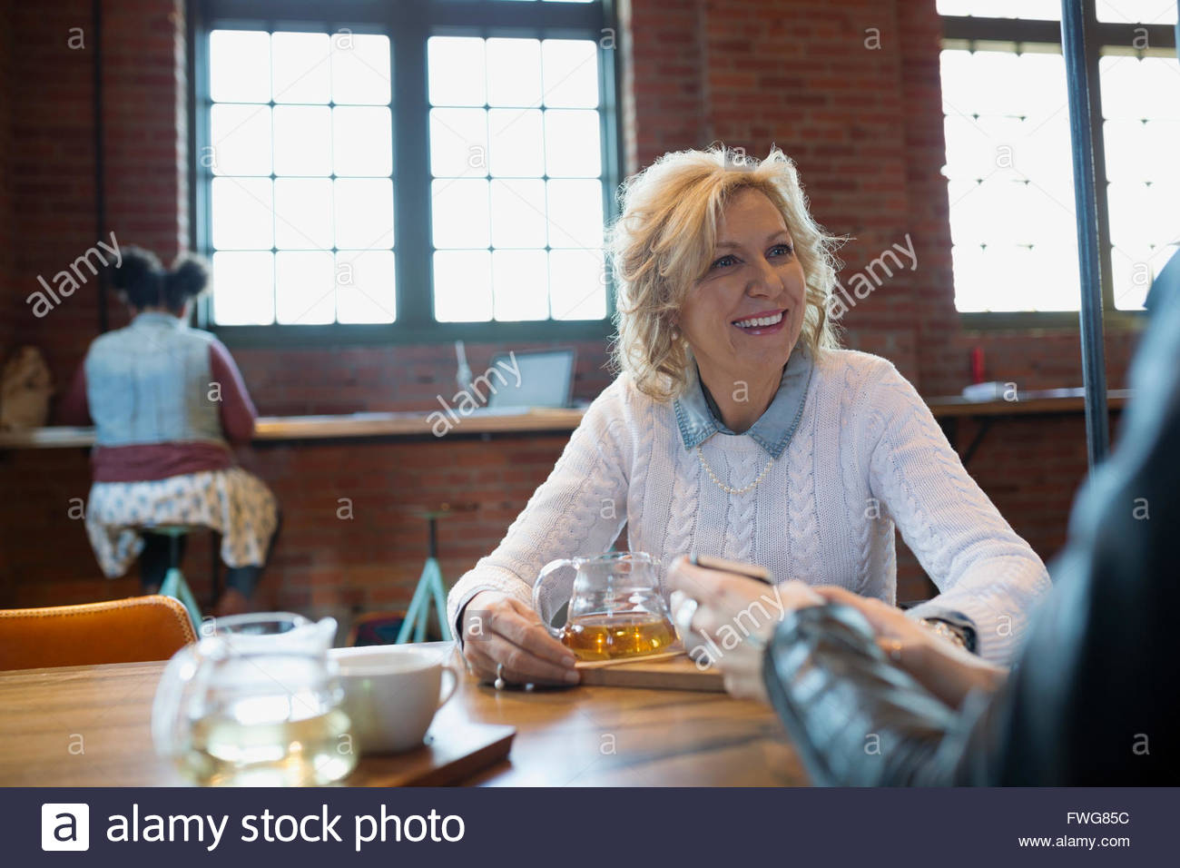 Mature woman drink tea hi-res stock photography and images - Alamy