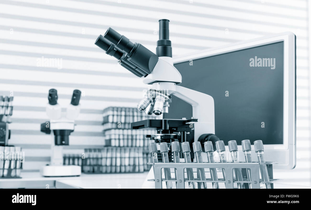 Microscope and computer monitor in the laboratory Stock Photo - Alamy