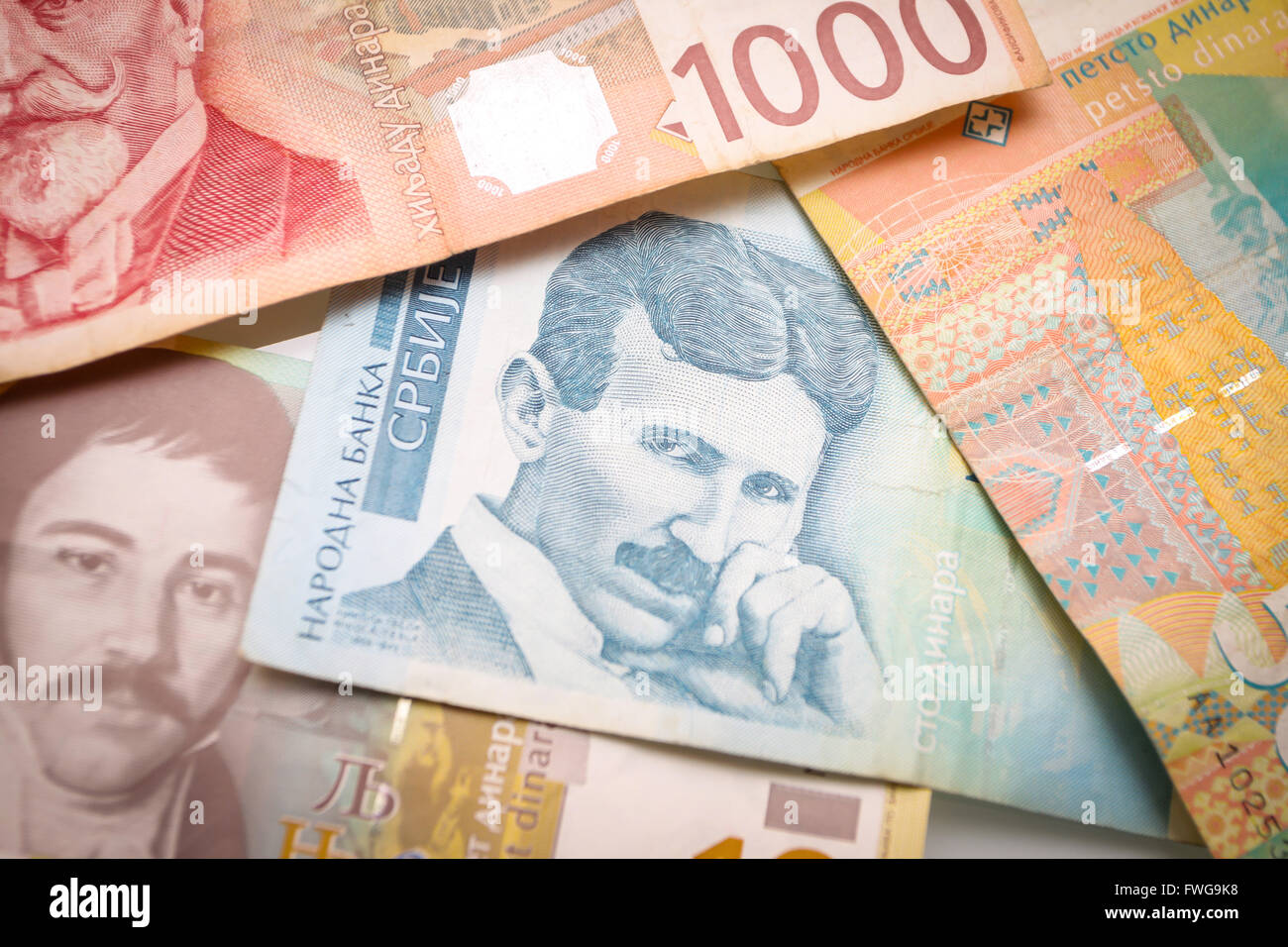 Different Serbian dinar bills scattered on white background Stock Photo ...