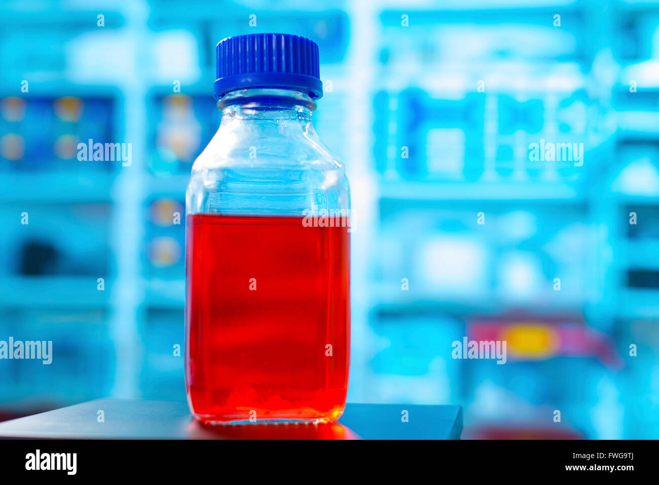 Red liquid in a plastic bottle Stock Photo - Alamy