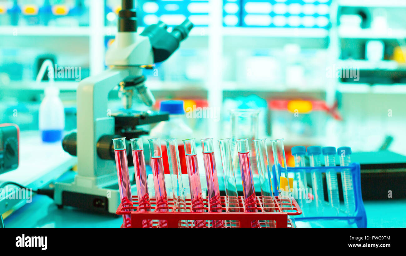 Laboratory equipment and test tubes in a rack Stock Photo - Alamy