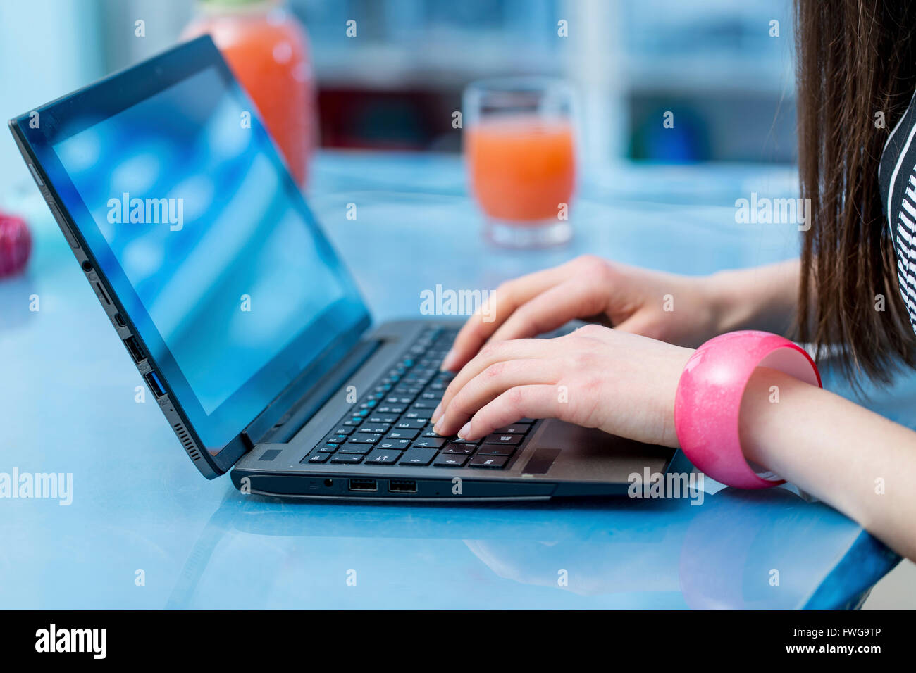 Person using a laptop Stock Photo - Alamy