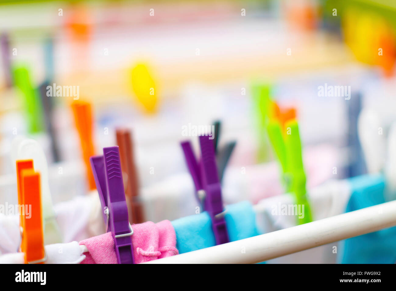Colourful clothes pegs, close up Stock Photo - Alamy