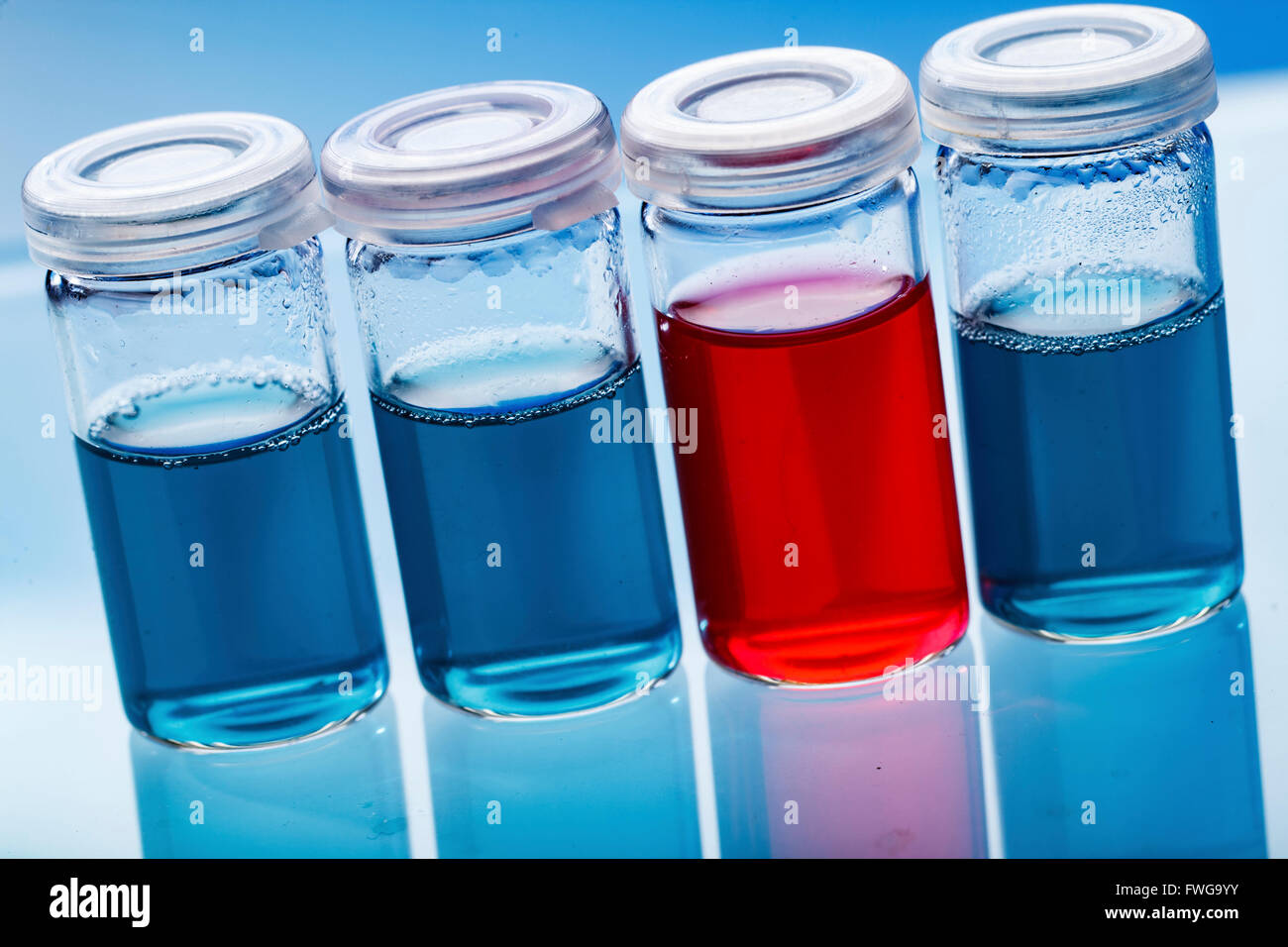 Vials with red and blue liquid Stock Photo - Alamy
