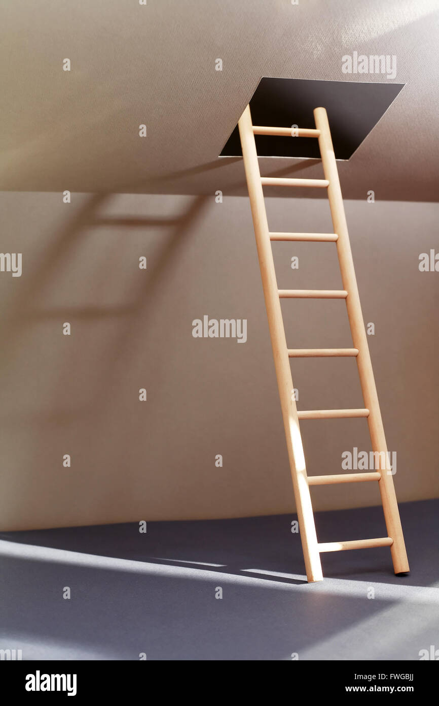 Escape concept. Wooden ladder in empty room with illuminated hatch in ...