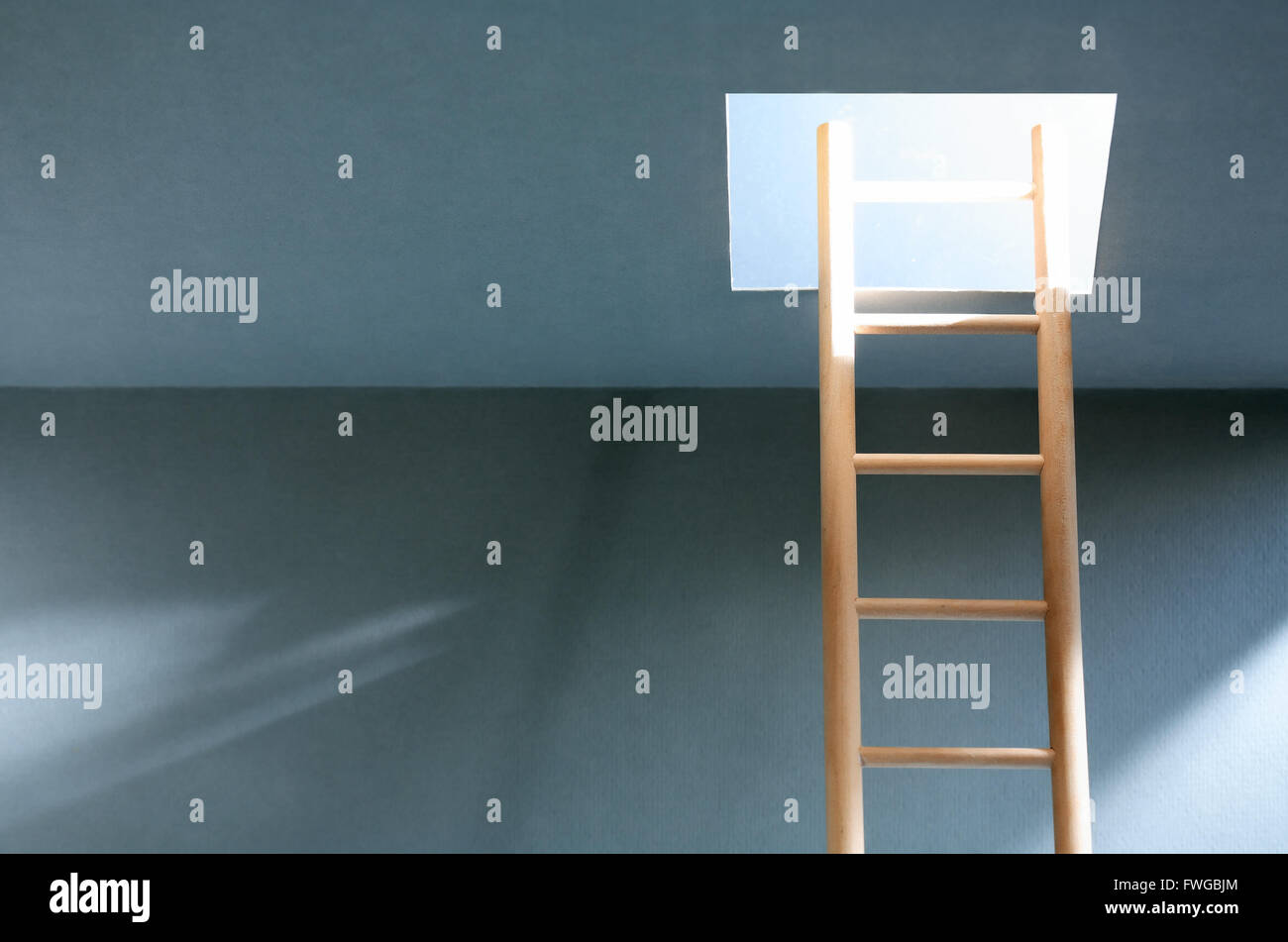 Escape concept. Wooden ladder in empty room with illuminated hatch in ...