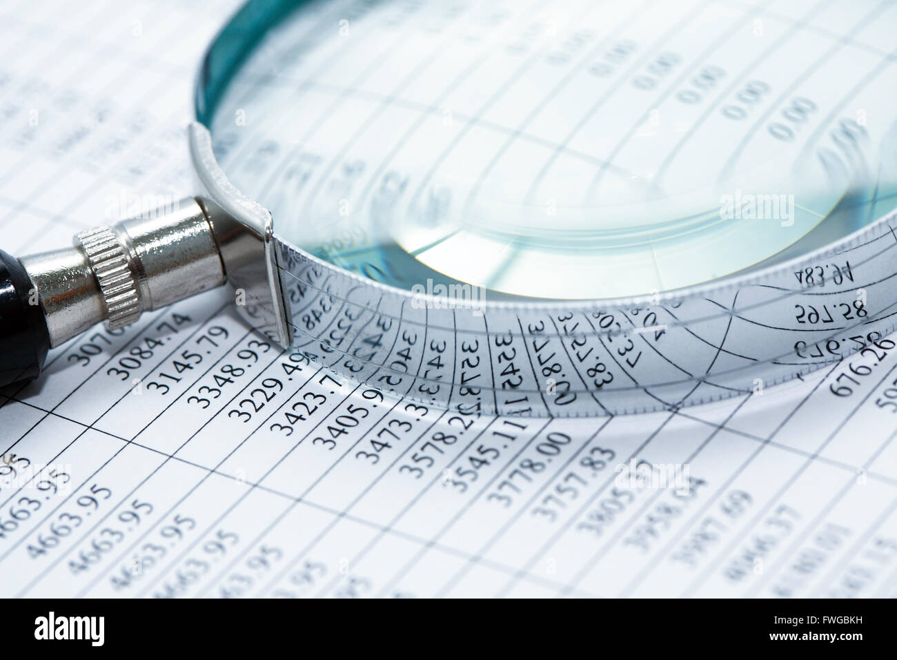 Digits on paper with magnifying hi-res stock photography and images - Alamy