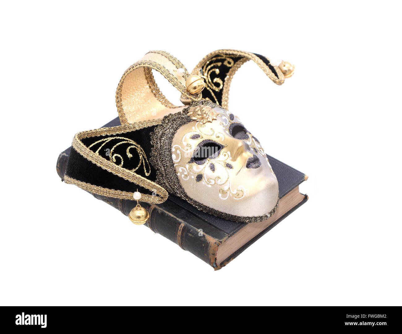 Art concept. Vintage still life with old book and Venetian mask Stock ...