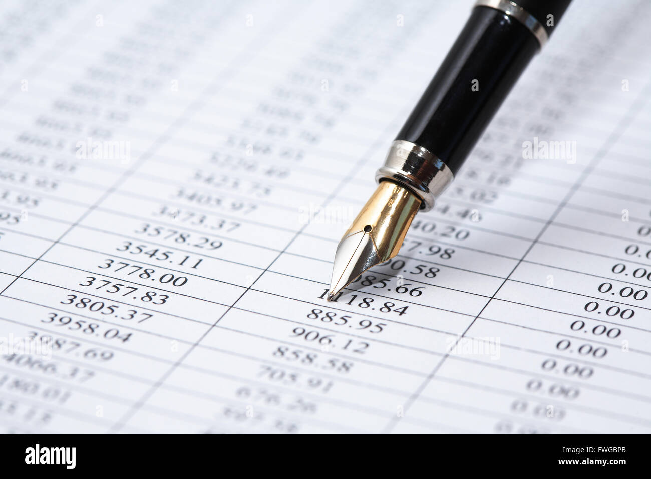 Fountain pen on paper background with digits Stock Photo - Alamy