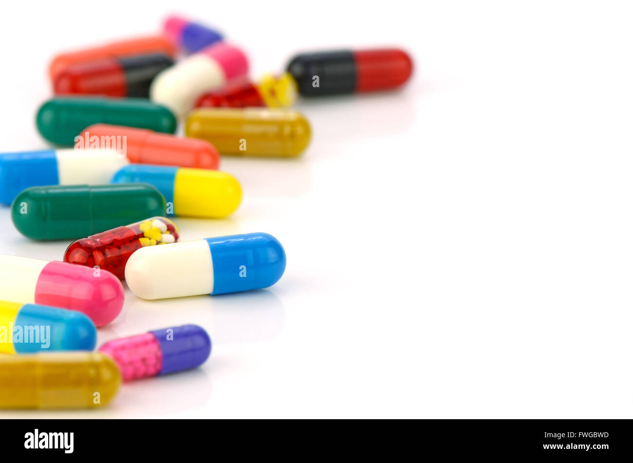 Colorful of oral medications on White Background Stock Photo - Alamy