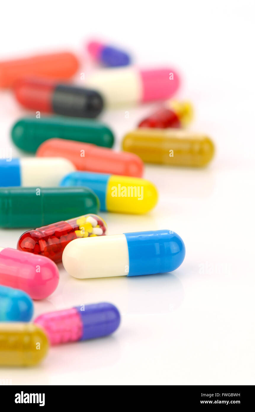 Colorful of oral medications on White Background Stock Photo - Alamy