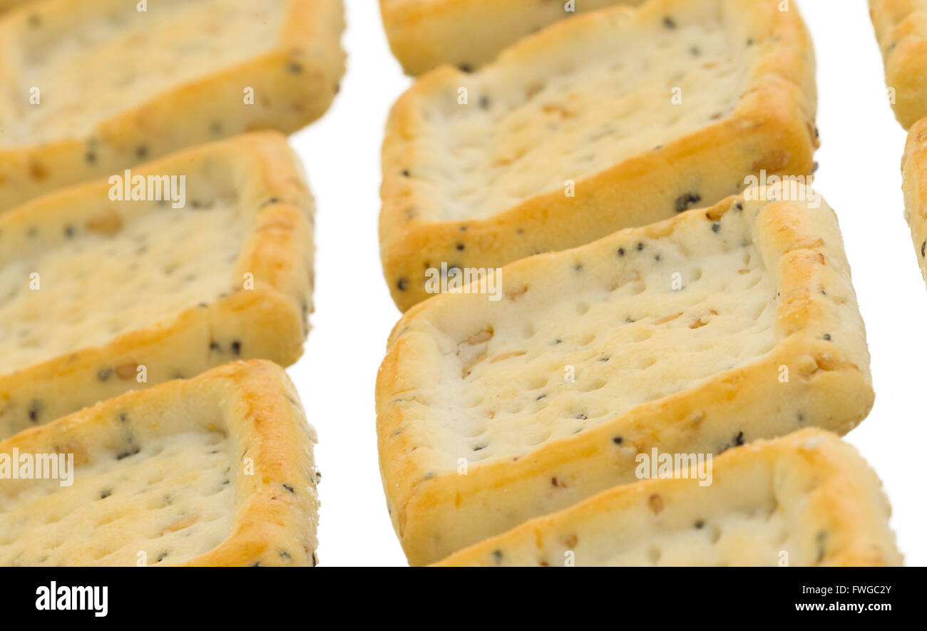Simple square crackers isolated on a white background, selective focus ...
