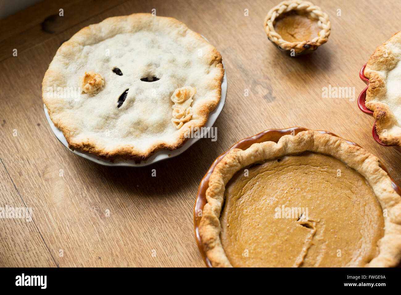 Overhead view of a freshly baked home made pie with pastry top and ...