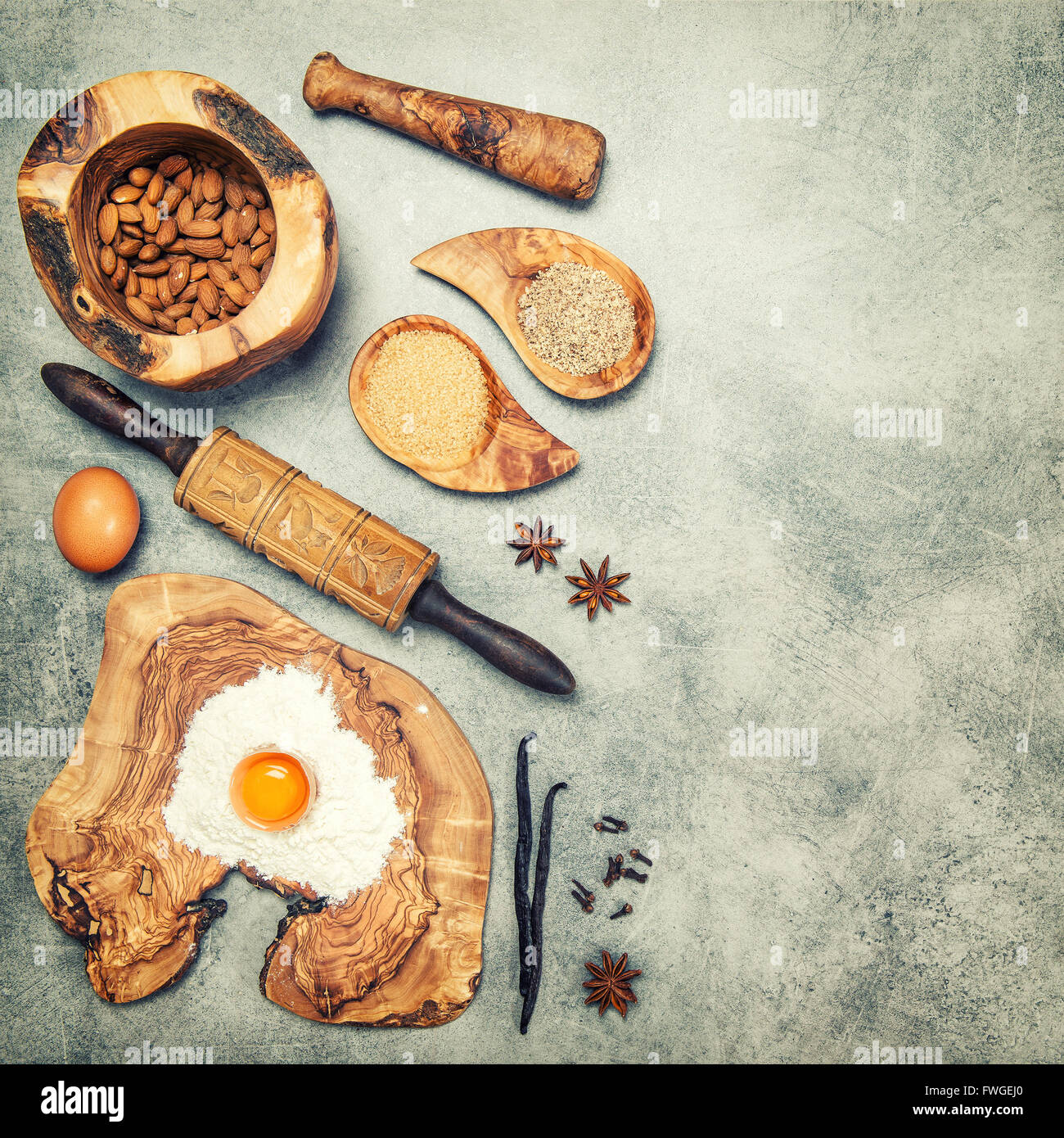 Baking ingredients and spices. Flour, eggs, sugar, almonds, vanilla ...