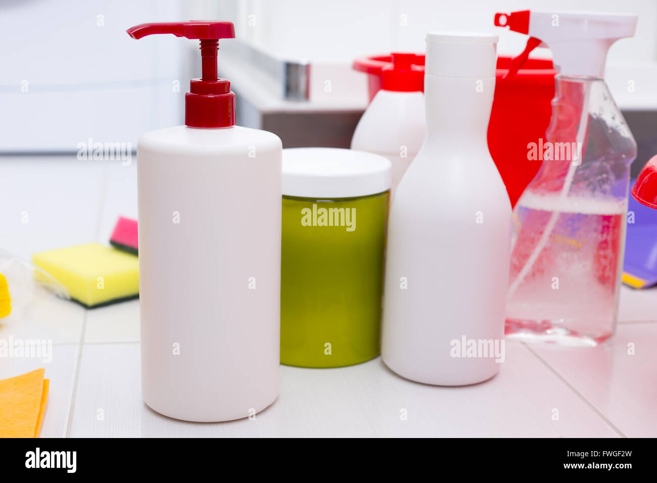 Assortment of household cleaning products in a variety of containers ...