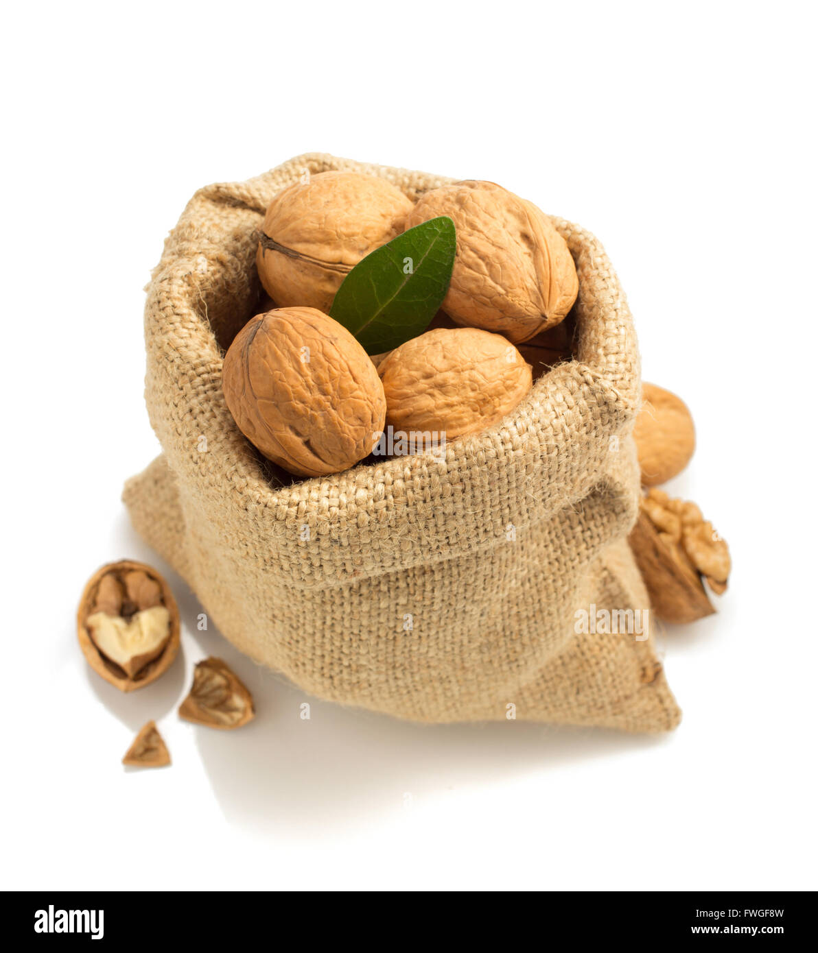 walnuts in bag isolated on white background Stock Photo - Alamy