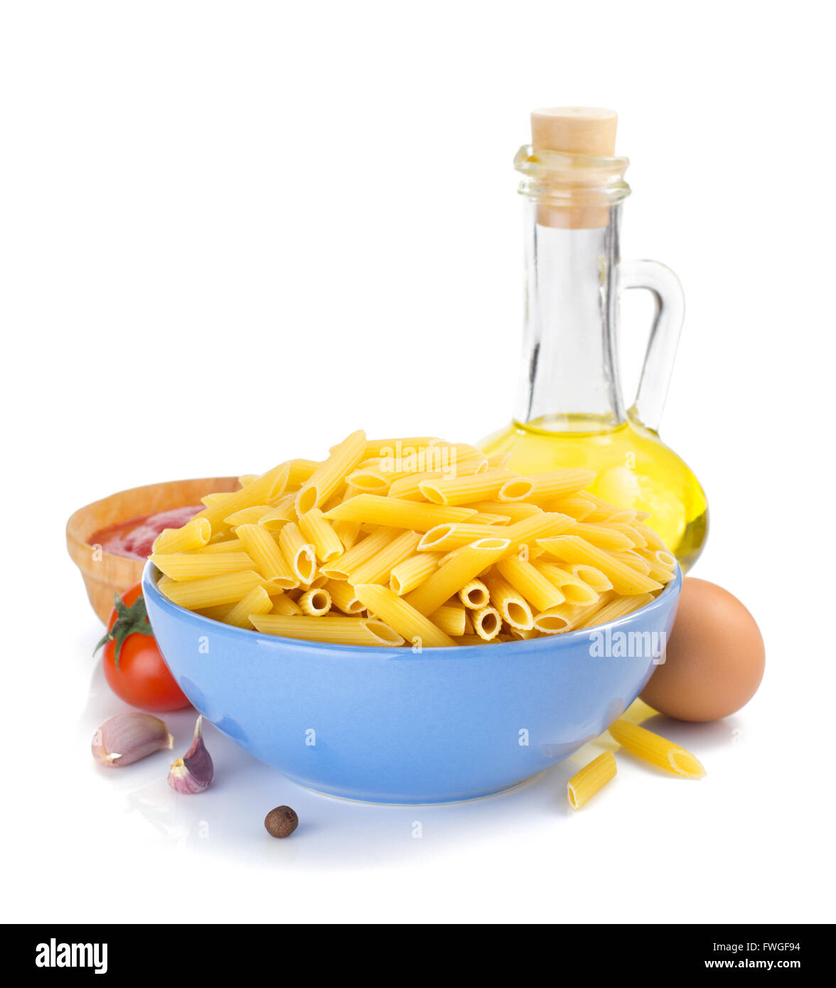 Bowl raw penne pasta Cut Out Stock Images & Pictures - Alamy
