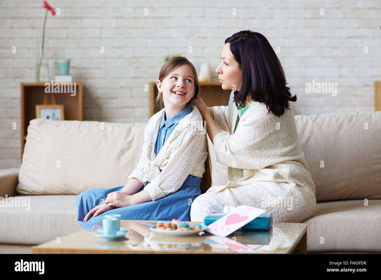 Talking to mother Stock Photo - Alamy
