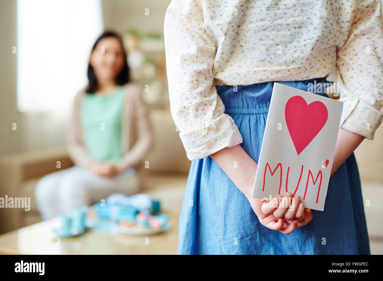 Hiding greeting card Stock Photo - Alamy