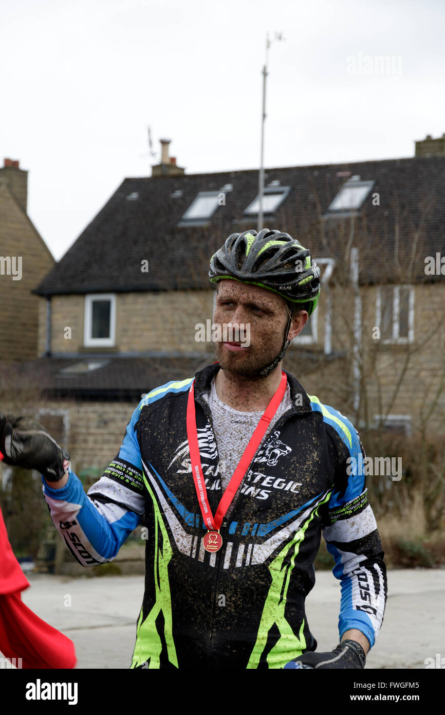 Man covered in mud finish line of mountain bike race held in Derbyshire ...