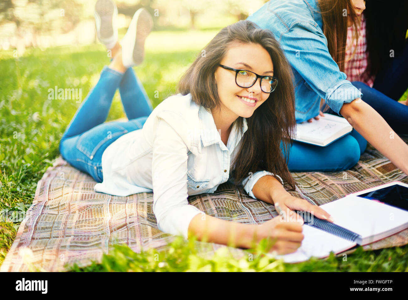 College girl writing note hi-res stock photography and images - Alamy