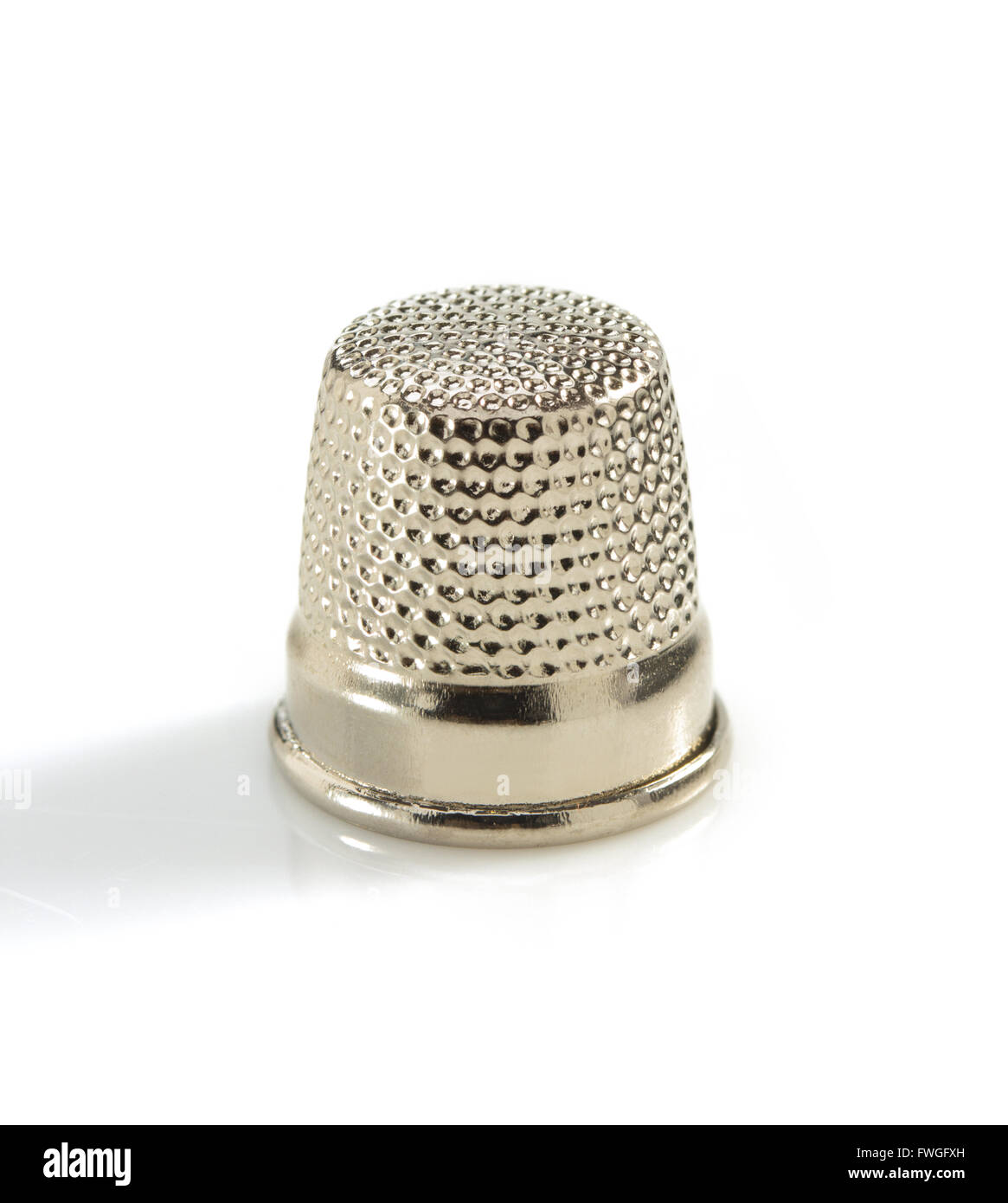 sewing thimble isolated on white background Stock Photo - Alamy