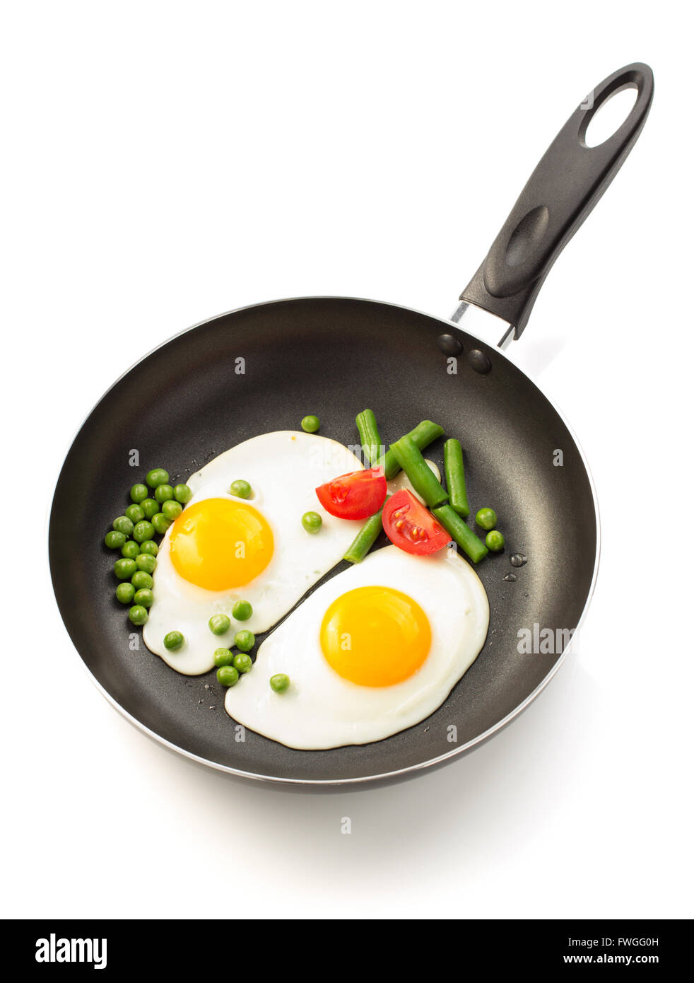 fried egg in frying pan isolated on white background Stock Photo - Alamy