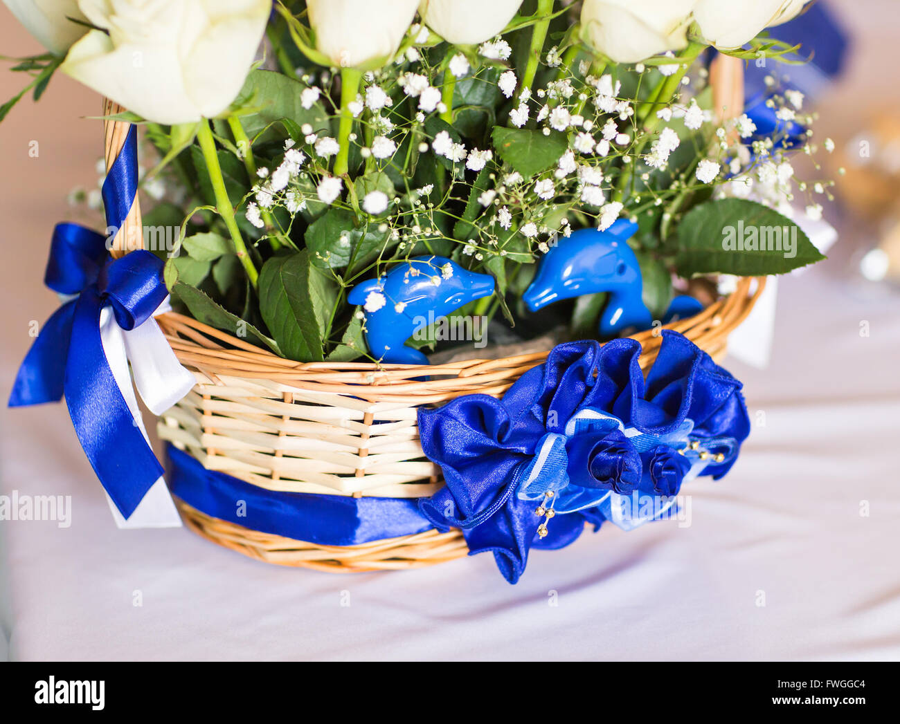 bouquet of white roses in basket Stock Photo - Alamy