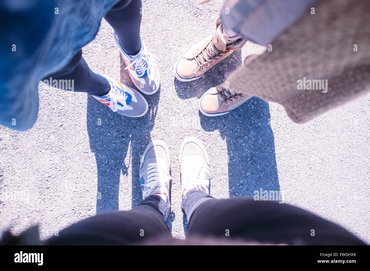 Three standing together hi-res stock photography and images - Alamy