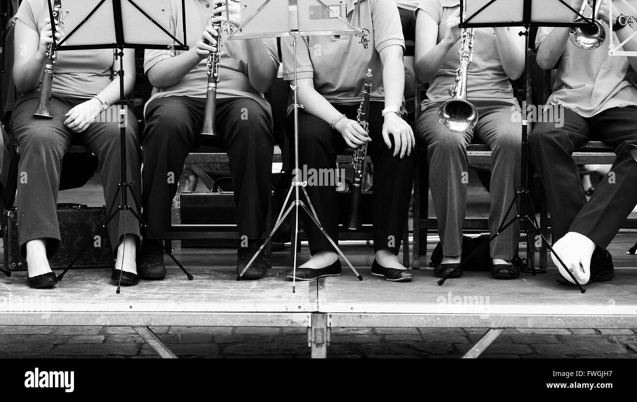 Legs Of Musicians Sitting On Stage Stock Photo - Alamy