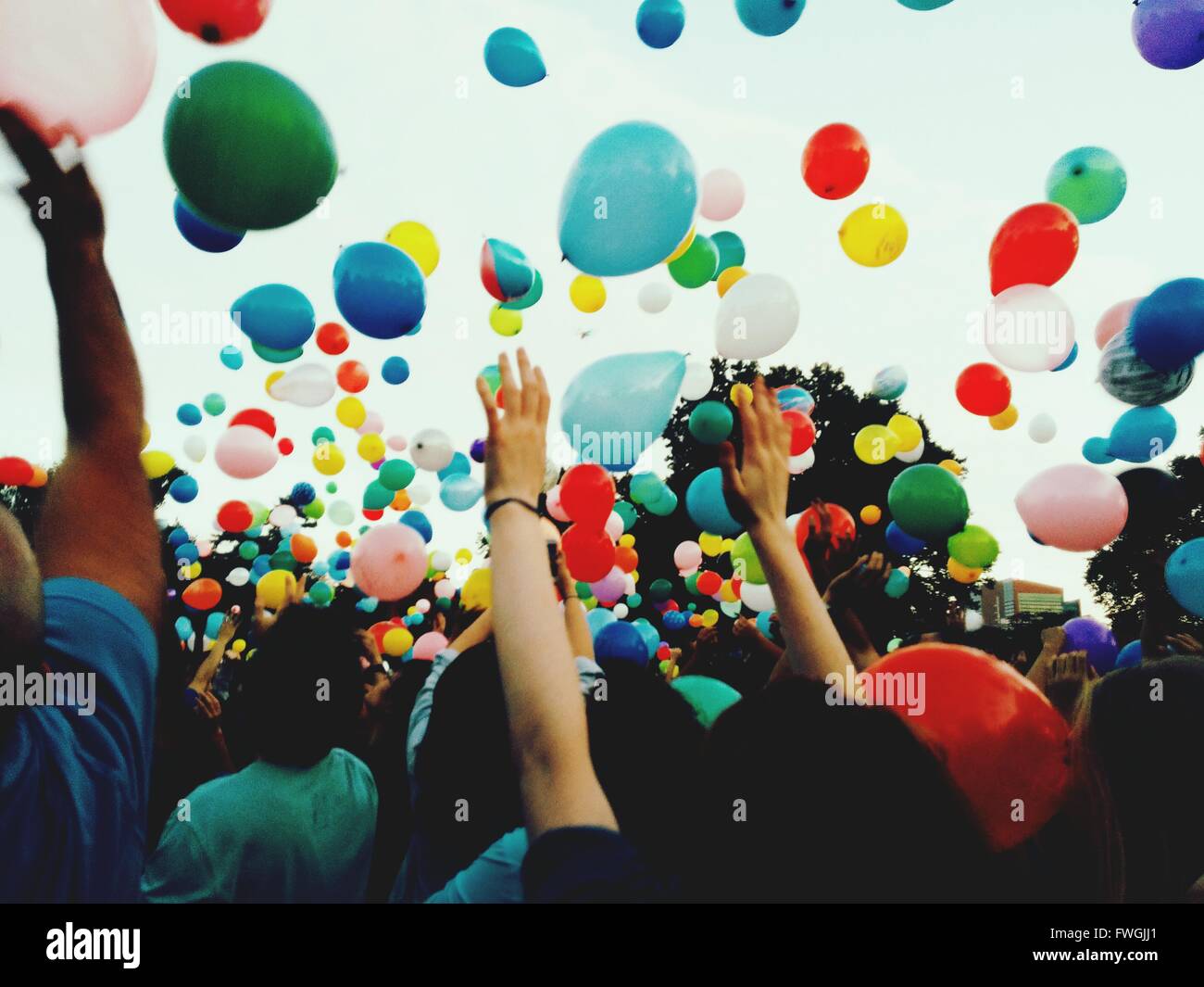 Throwing balloons hi-res stock photography and images - Alamy