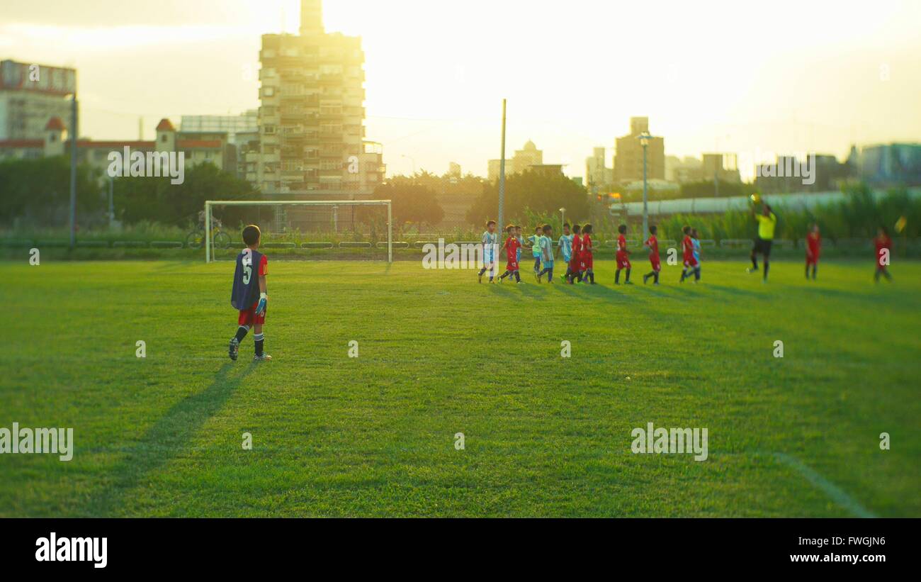 Children Playing Soccer On Field Stock Photo - Alamy