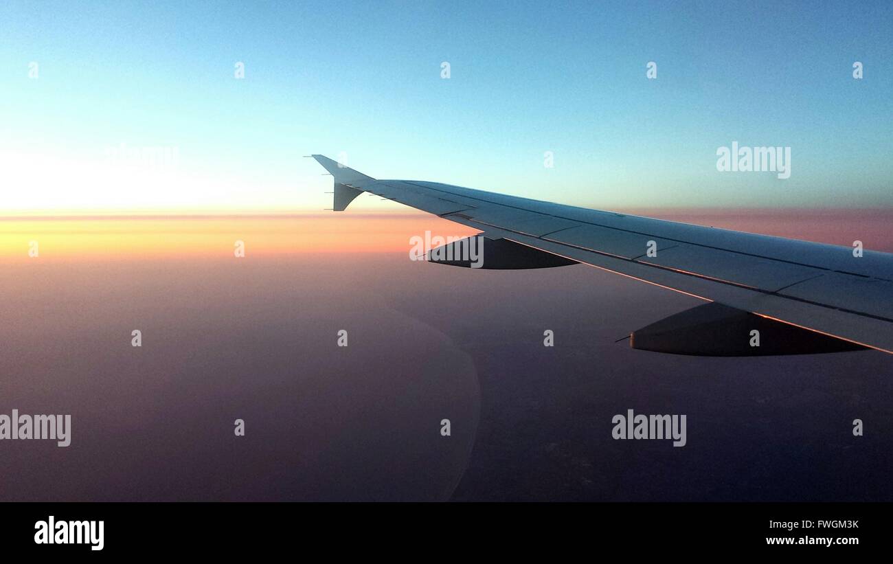 Cropped Image Of Airplane Flying In Sky Stock Photo - Alamy