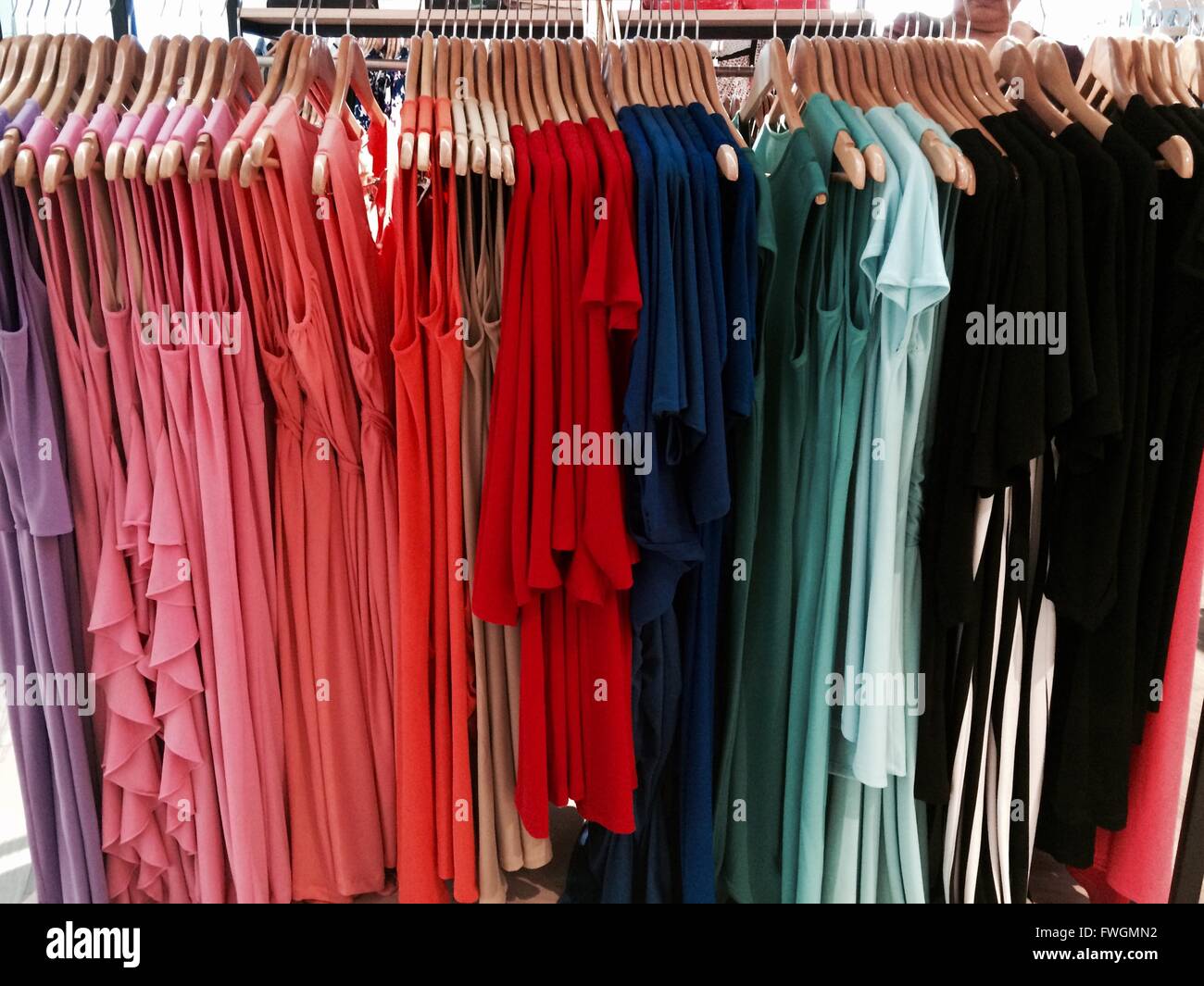 Dresses on rack hi-res stock photography and images - Alamy