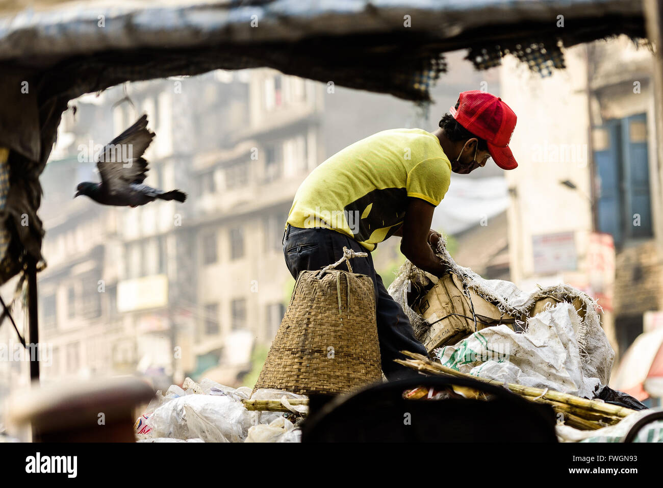 A man collecting garbage in Nepal Stock Photo - Alamy