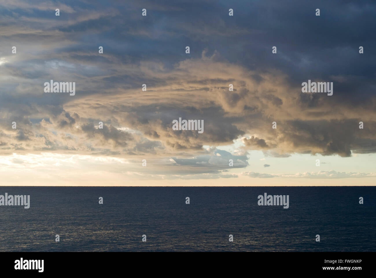 Dramatic dark clouds hovering hi-res stock photography and images - Alamy