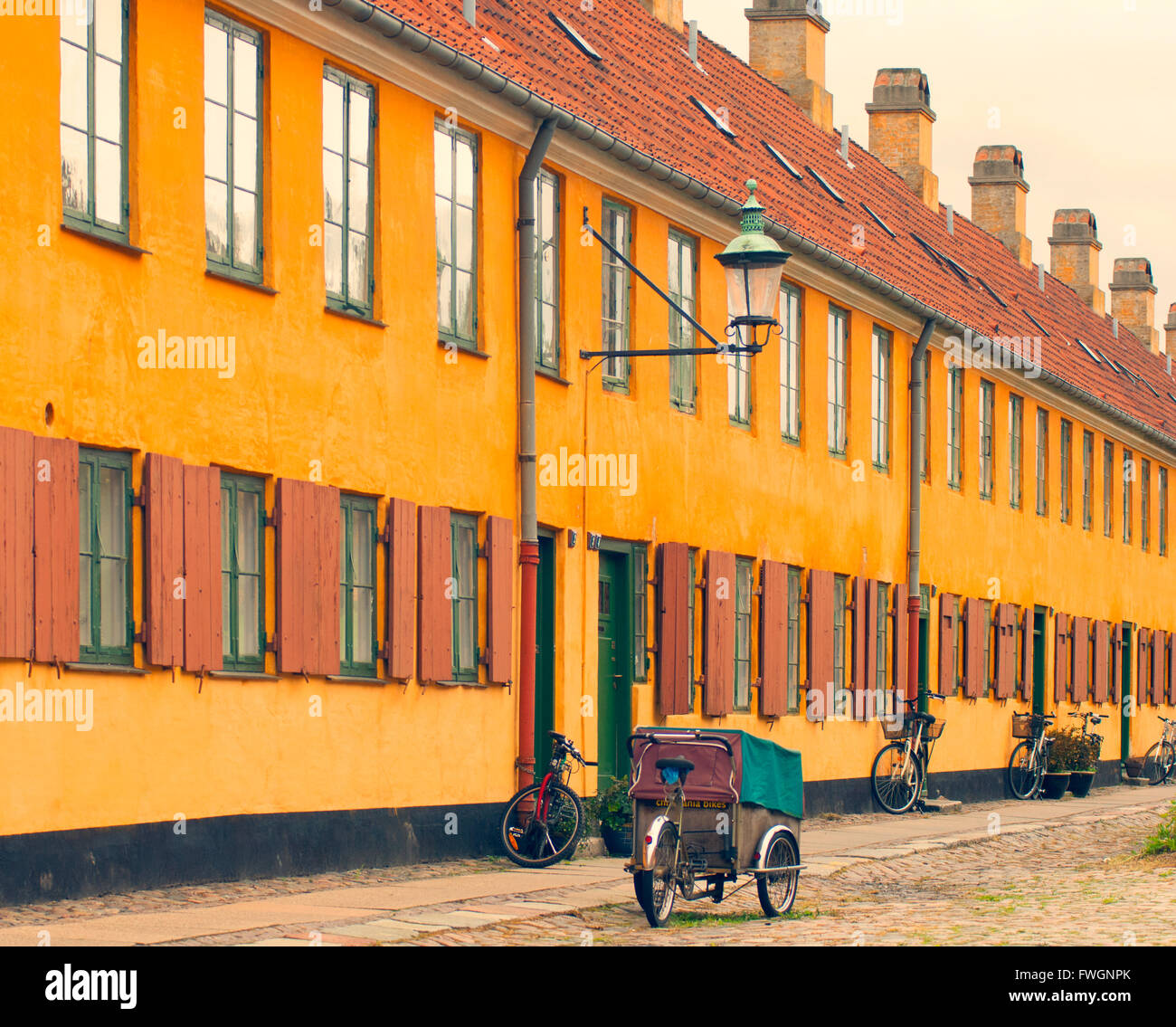 Colourful houses in the old area of Nyboder, Copenhagen, Denmark ...