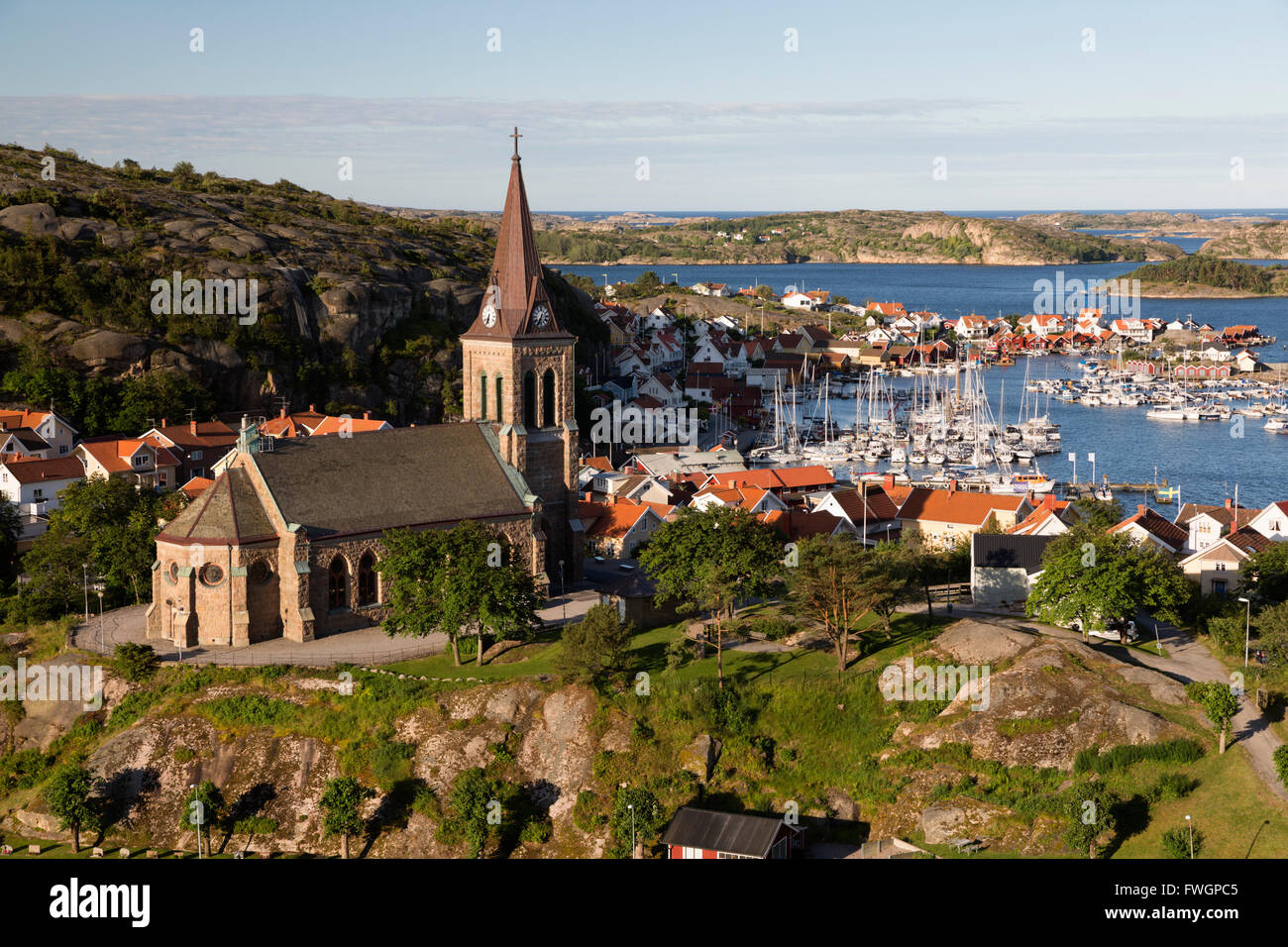 View over harbour and town with Vetteberget cliff, Fjallbacka, Bohuslan Coast, Southwest Sweden ...