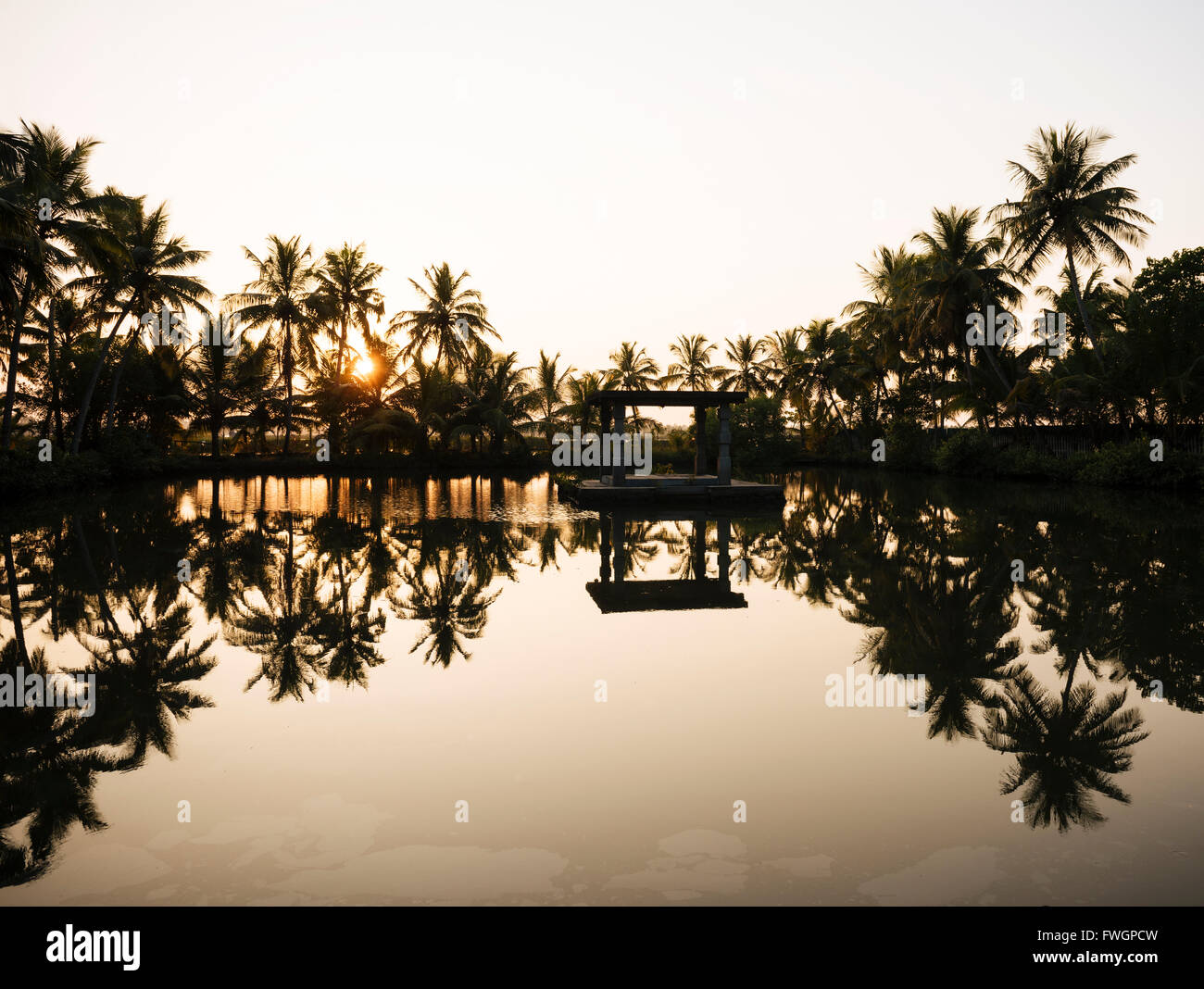 View of lake at sunset, backwaters near North Paravoor, Kerala, India ...