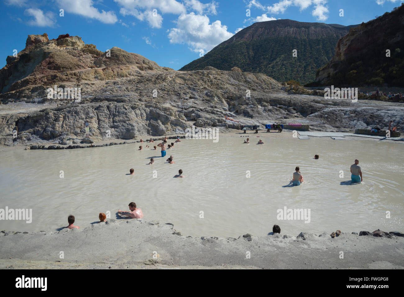Bathers enjoying the volcanic mud in the hot spring pool, Vulcano ...