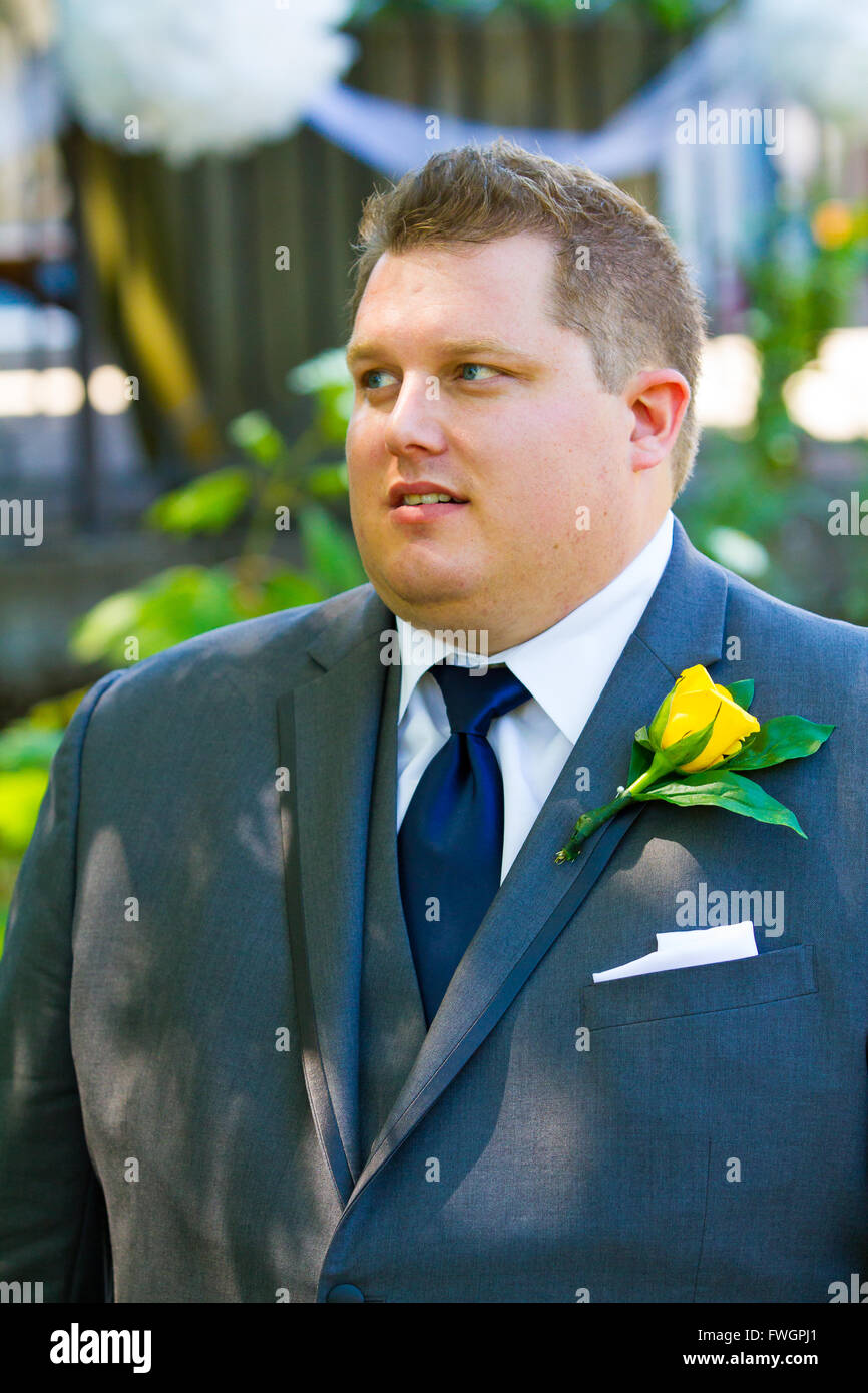 Portraits of a groom on his wedding day while waiting for his bride at ...