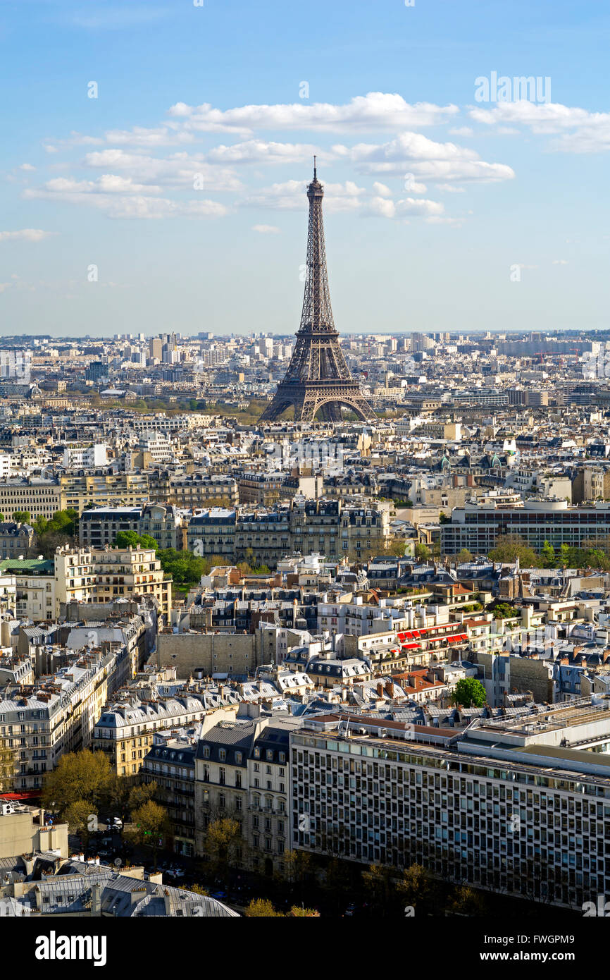 Elevated view over the city with the Eiffel Tower in the distance ...