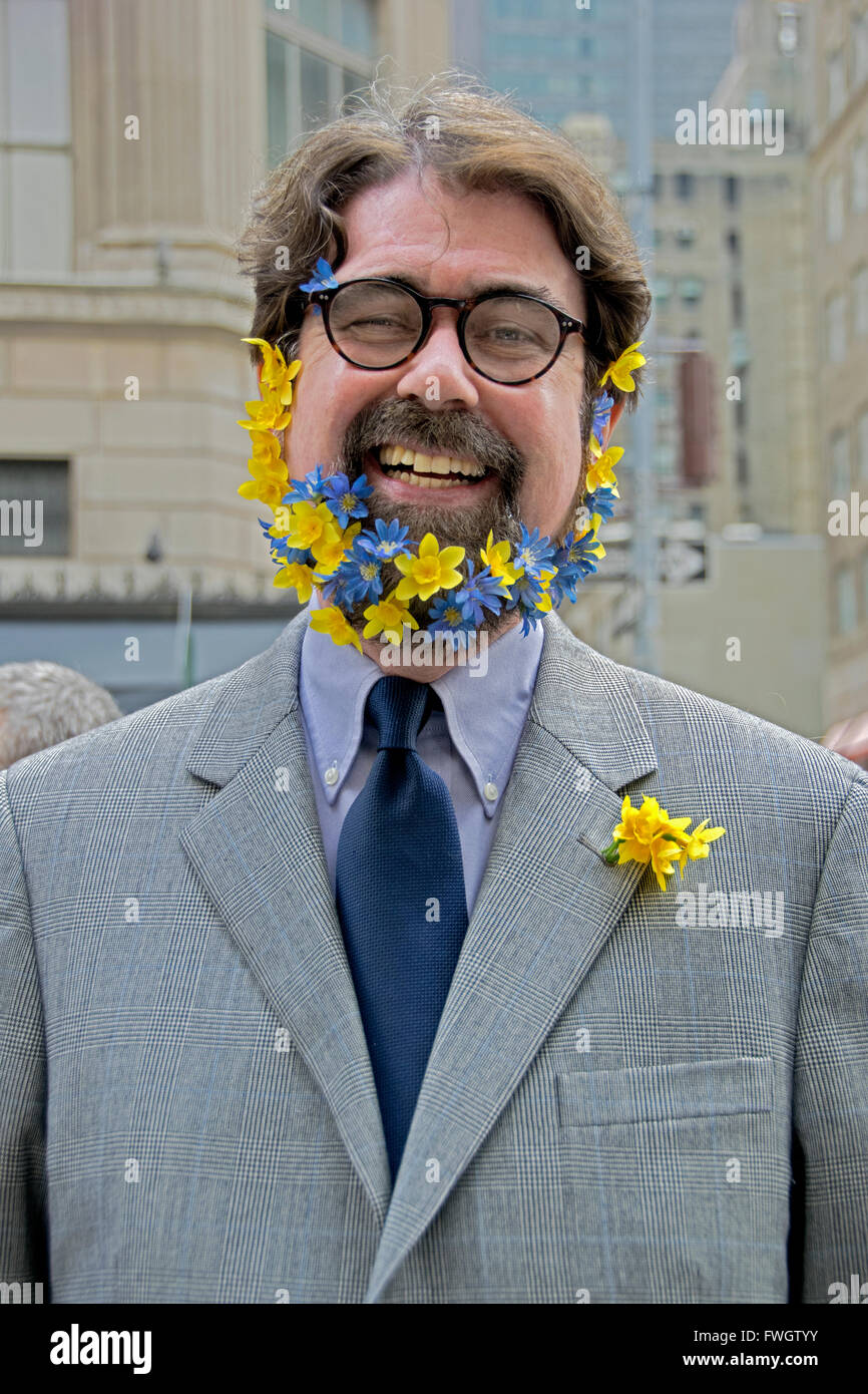An oddly dressed man with flowers on his face, beard and lapel on Fifth ...