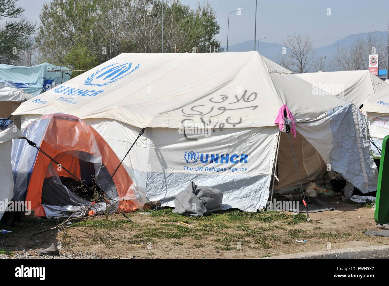 Syrian barber cuts hair for 3.50 euros, is writen on the tent - 1 April ...