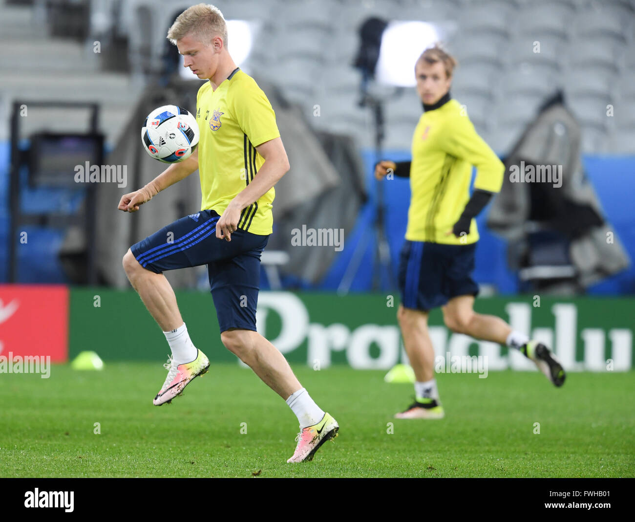 Olexandr Zinchenko (l) of Ukraine during a training session at Stade ...