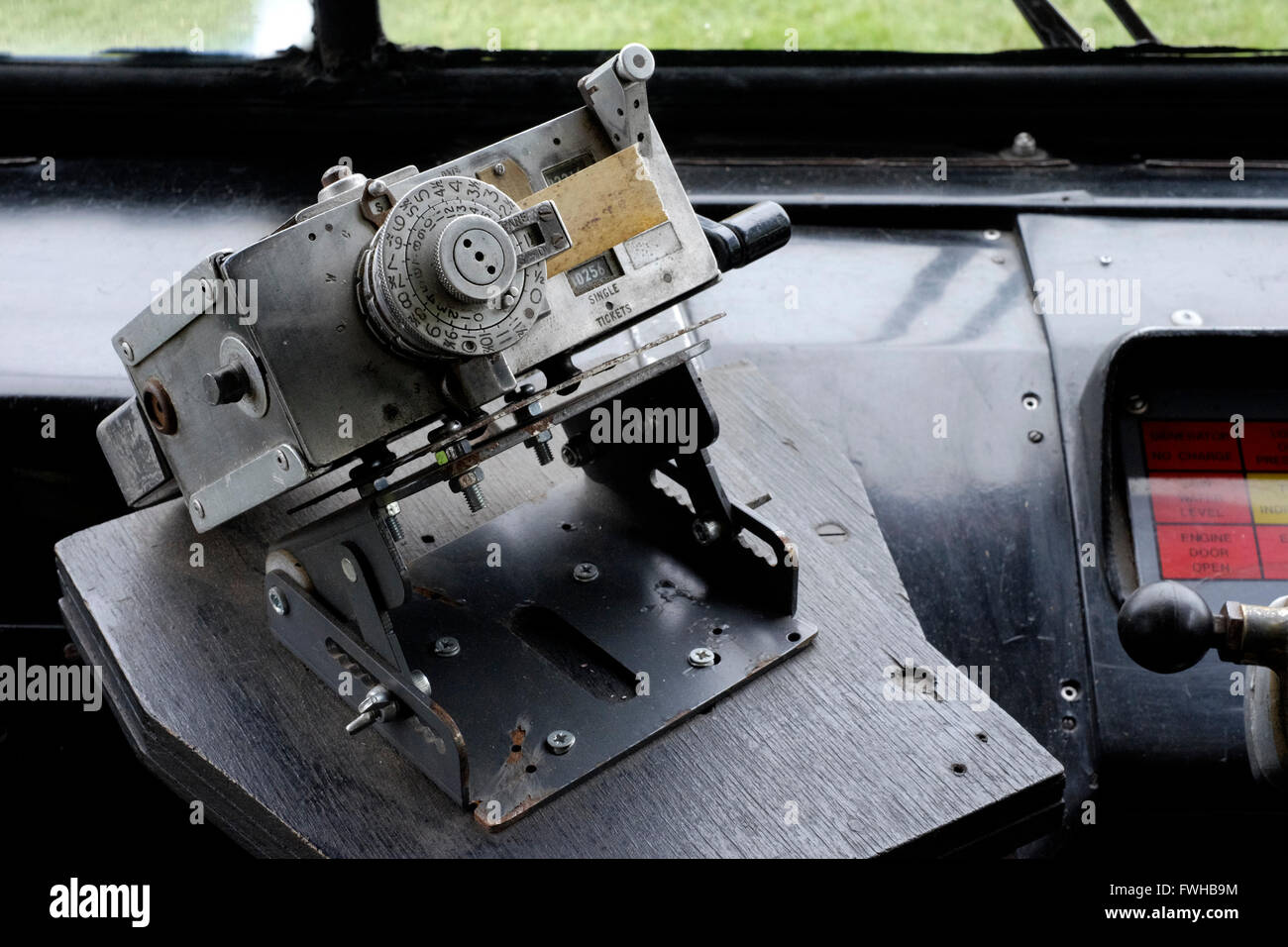 an old style ticket machine in a bus cab at a show of classic vintage ...